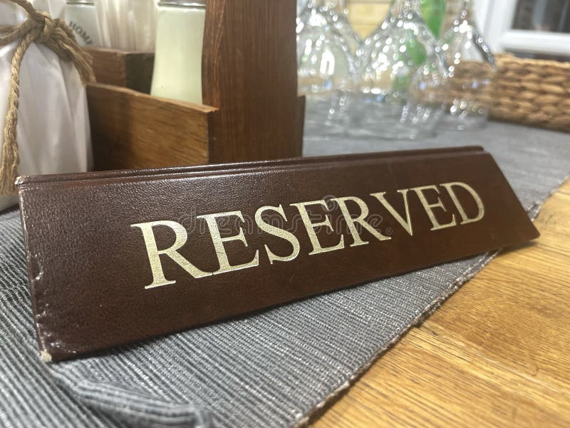 Reserved Sign on a Table Setting Stock Image - Image of restaurant ...