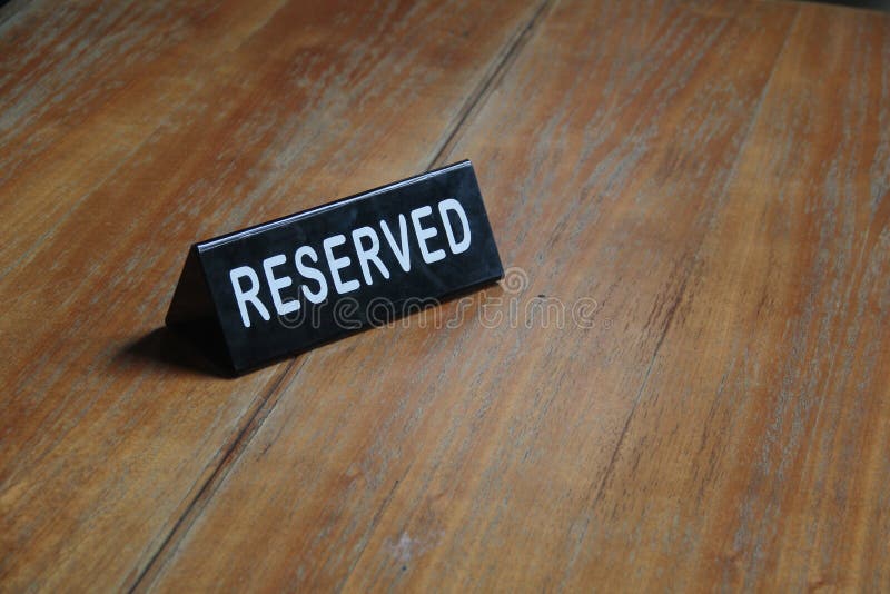 Reserved Signage on a Table at a Restaurant Stock Image - Image of ...