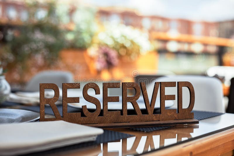 Reserved Table Sign in a Restaurant on Summer Terrace Stock Photo ...