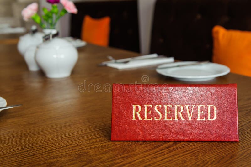 Reserved table stock image. Image of business, flowers - 56905597