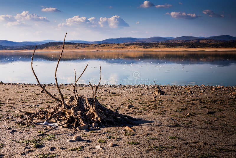 Reservoir almost Empty Due To Drought Stock Photo - Image of ground ...
