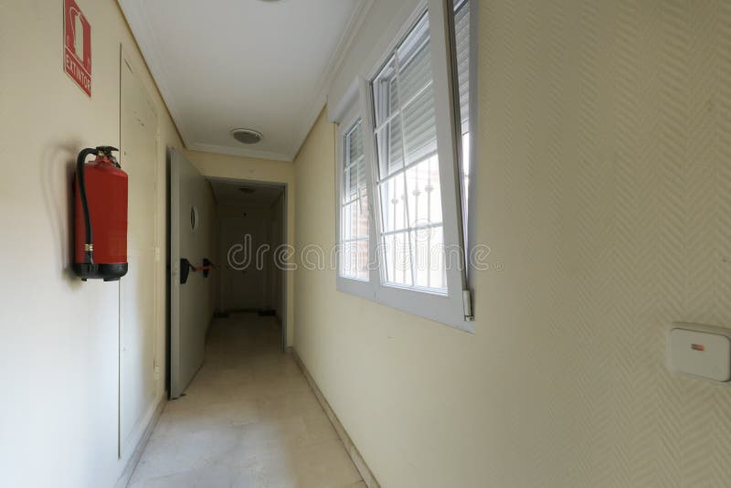 Residential Apartment Building Corridor with Fireproof Doors and ...