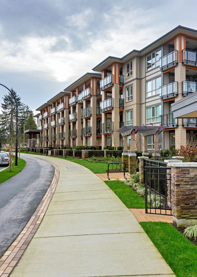 Residential Apartment Building with Walking Pathway in Front Stock ...