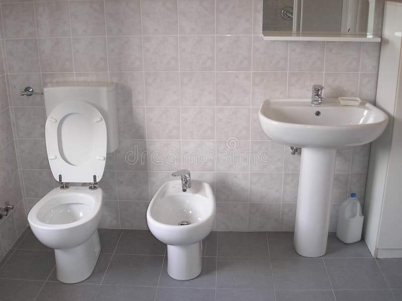Residential Bathroom Basin, Wc and Bidet Stock Photo - Image of room ...