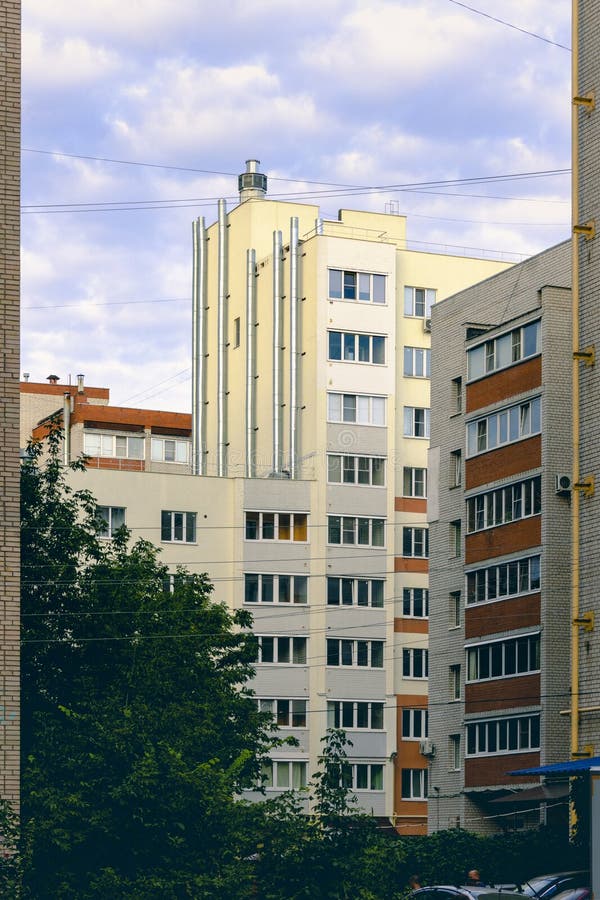 Residential Building in the City between the Buldings Stock Image ...