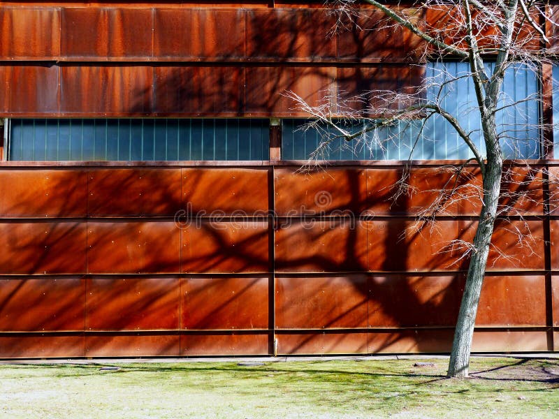 Industrial Building with Rusty Facade and Shadows Stock Photo - Image ...