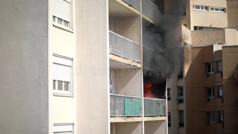 Residential Building on Fire, Flames and Smoke Breaking Out from the ...