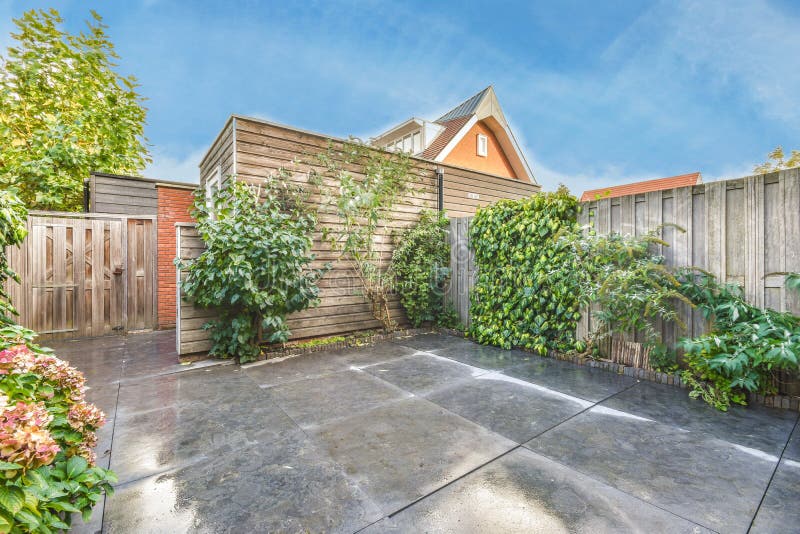 Residential building yard stock photo. Image of yard - 236486434