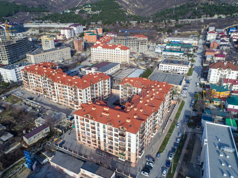 Residential Complex of Three Multi-storey Buildings with Red Roofs. the ...