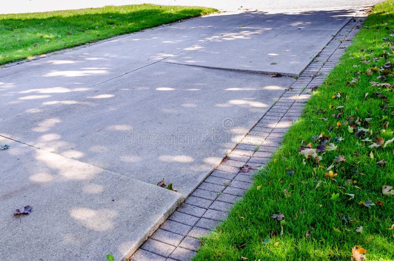 Residential Concrete Driveway with Sunken Pad Stock Image - Image of ...
