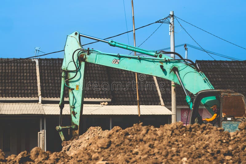 Residential Construction Progress with Excavator. Excavator Working for ...