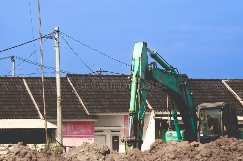 Residential Construction Progress with Excavator. Excavator Working for ...