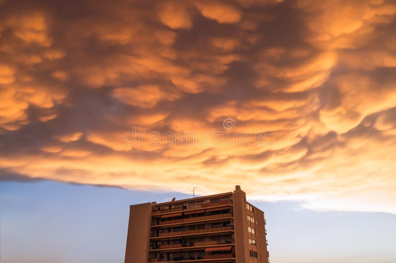Residential Ower Building Under Dramatic Sunset Cloud Stock Photo ...