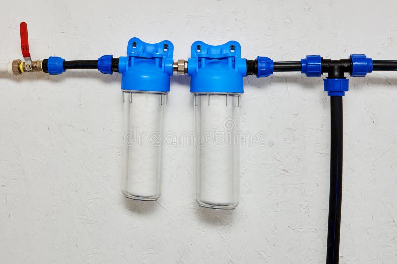 Residential Water Filtration System Installation on White Wall Stock ...