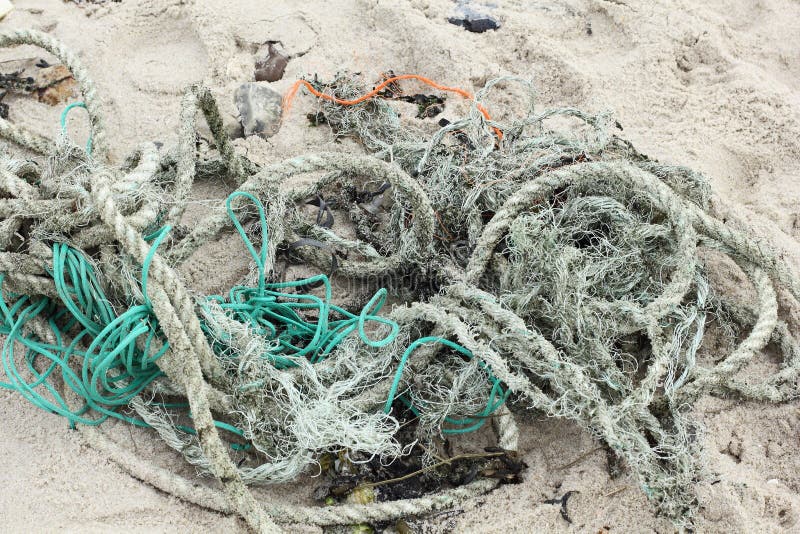 Plastic Waste and Residues of Nets on the Beach Stock Image - Image of ...