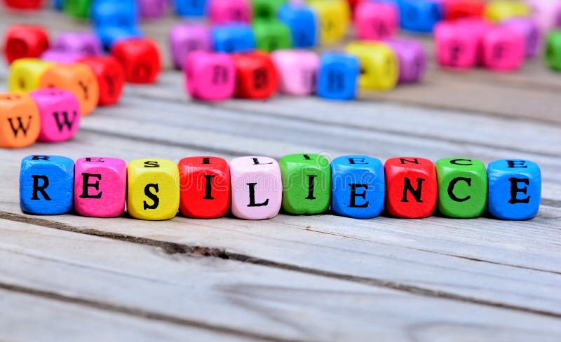Resilience word on table stock photo. Image of cause - 82589148