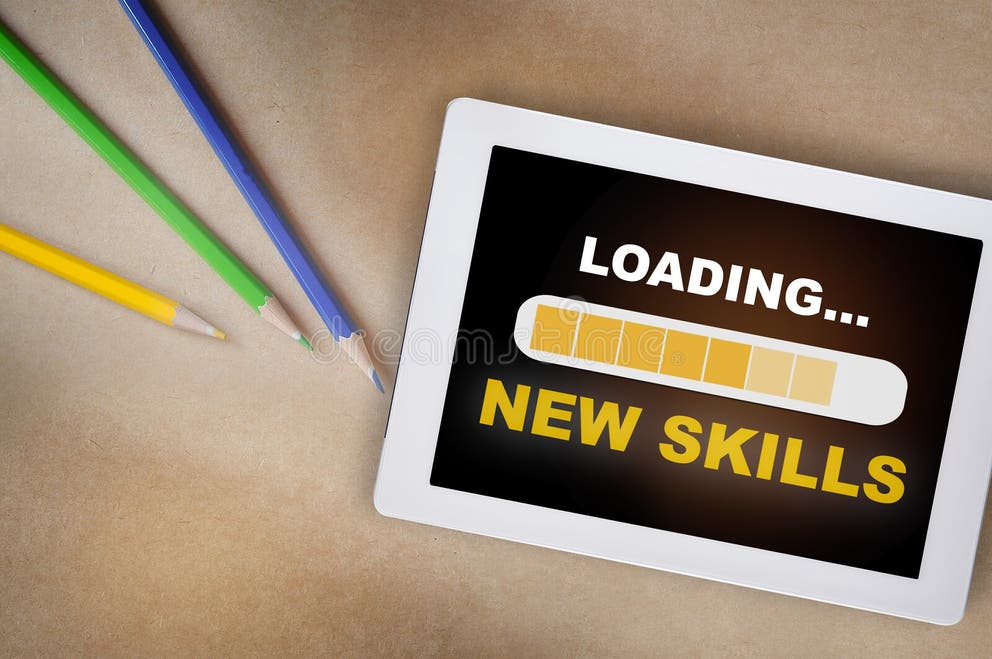 New Skills Loading on Computer Digital Tablet with Coloured Pencil on ...