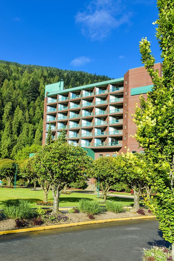 Resort Building with Mounting View and Blue Sky Background Stock Photo ...