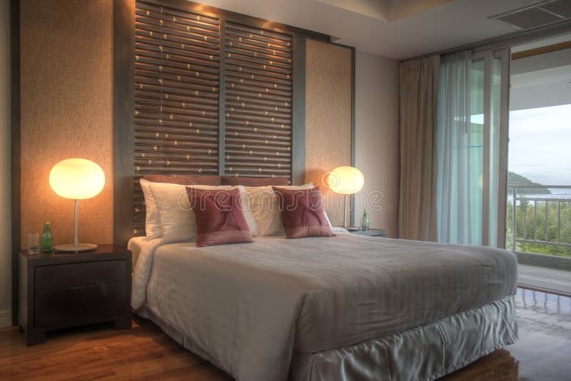 Resort hotel bedroom stock image. Image of pillow, indoor - 10200549