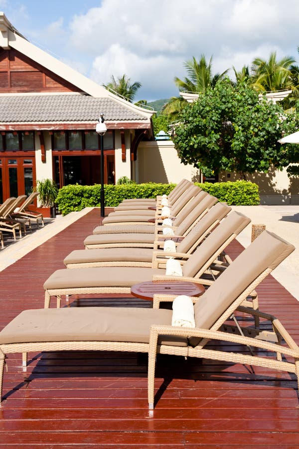 Resort lounge chairs stock image. Image of hotel, lounge - 21158927