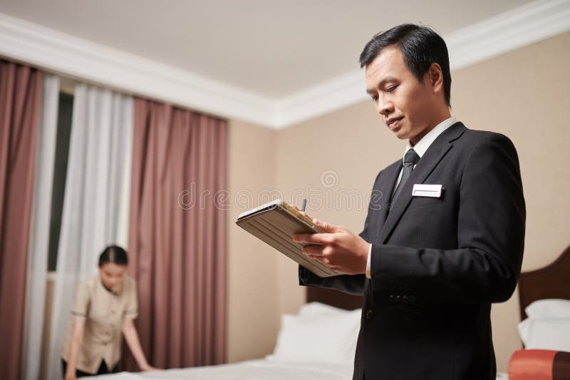 Resort Manager Signing Document Stock Photo - Image of clean, manager ...