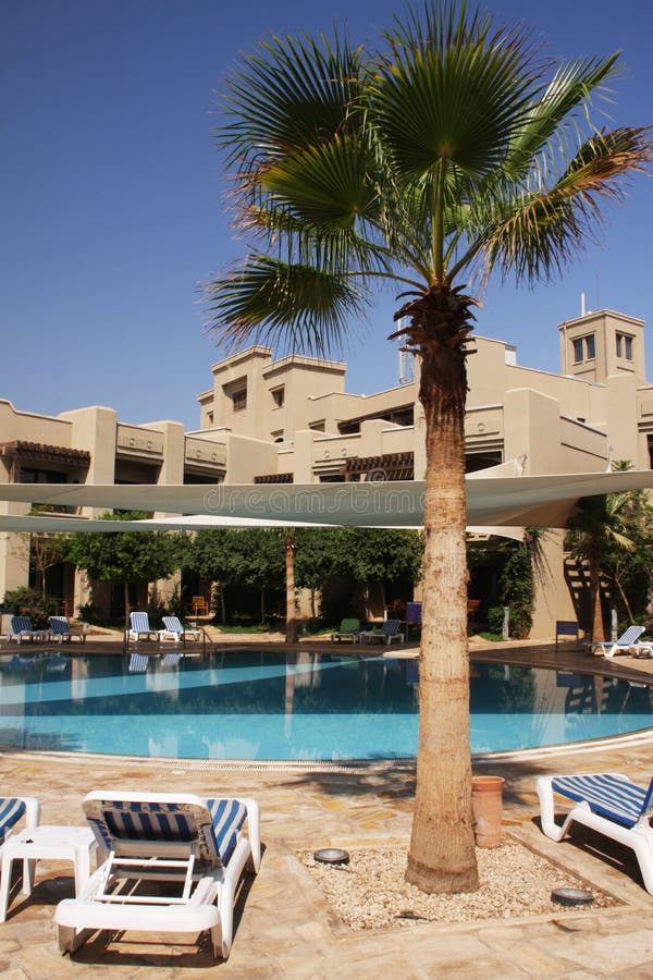 Resort pool stock image. Image of luxurious, posh, deluxe - 27216009