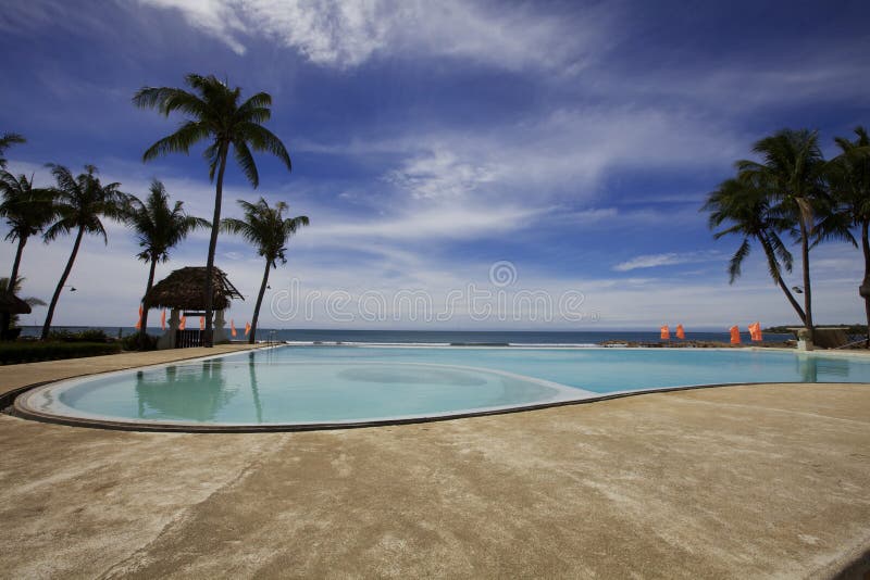 Resort Pool on Ocean stock photo. Image of leisure, landscape - 23478048