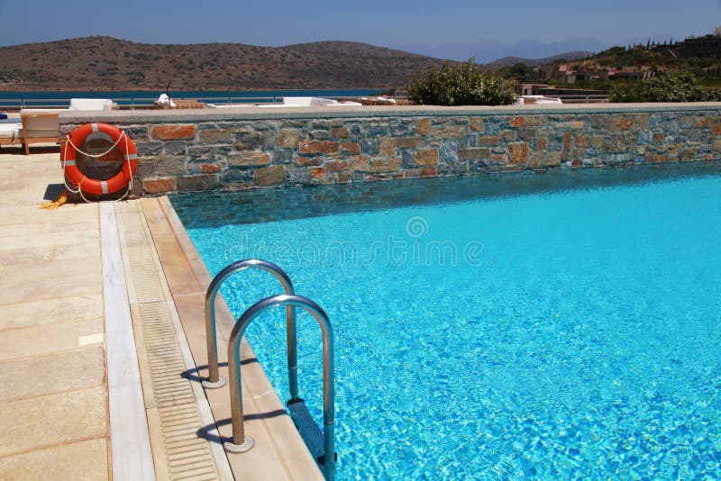 Resort Pool Overlooking Sea Stock Image - Image of glisten, overlooking ...