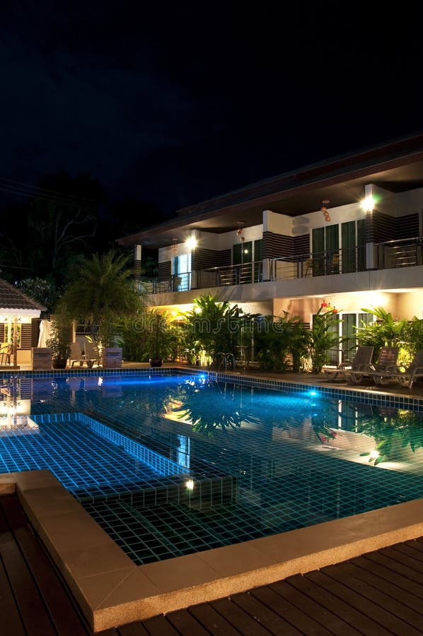 Resort with swimming pool stock image. Image of night - 45442777