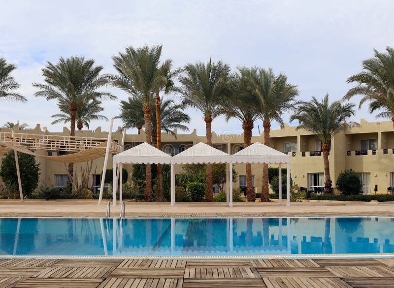 Resort Swimming Pool for Relaxation with Sunbeds Stock Image - Image of ...