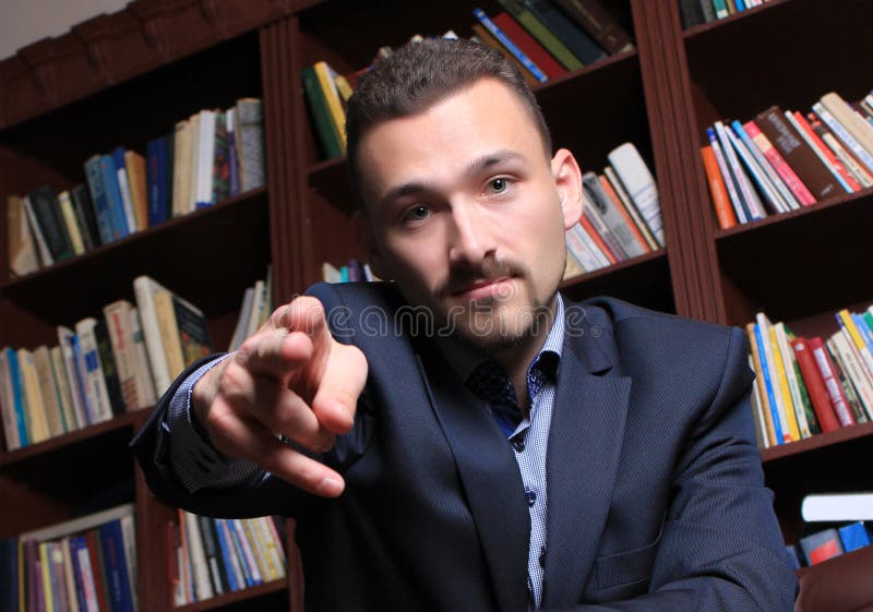 Respectable Man Next To a Bookshelf Stock Image - Image of elegant ...