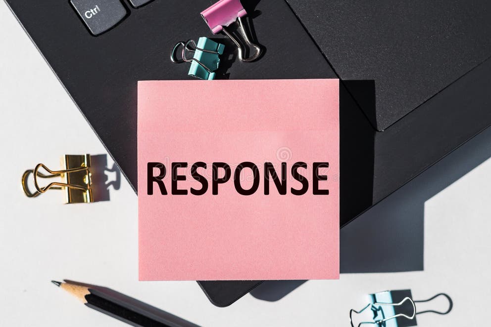 RESPONSE Note is Written on a Paper Sticker on a Laptop Keyboard Stock ...