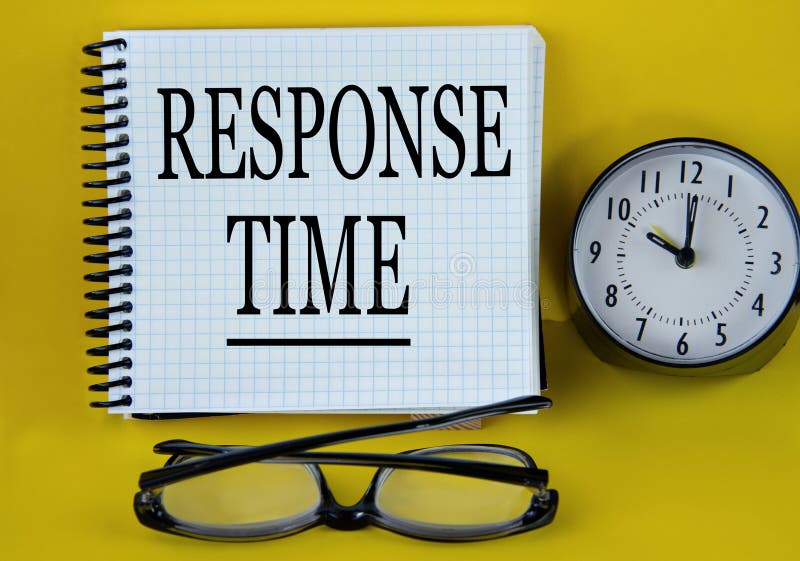 RESPONSE TIME - Words in a White Notebook with Alarm Clock and ...