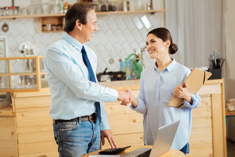 Responsible Confident Workers Smiling and Shaking Hands. Stock Photo ...