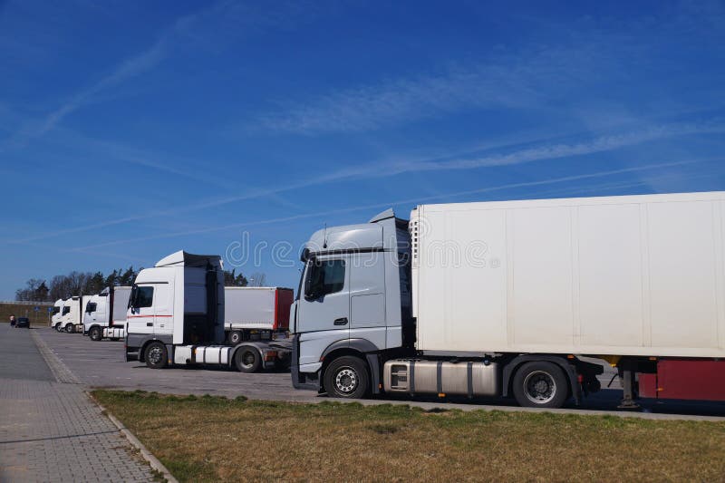 Rest Area for Drivers. a Row of Trucks in the Parking Lot Stock Photo ...