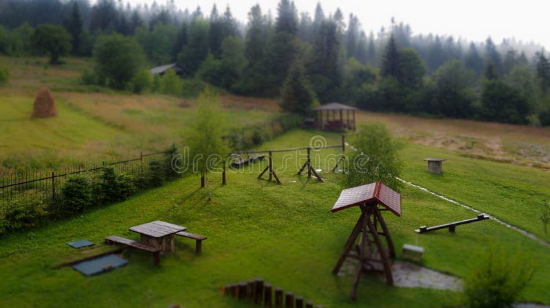 Rest Area on a Green Lawn Near the Forest. Tilt Shift Effect Stock ...