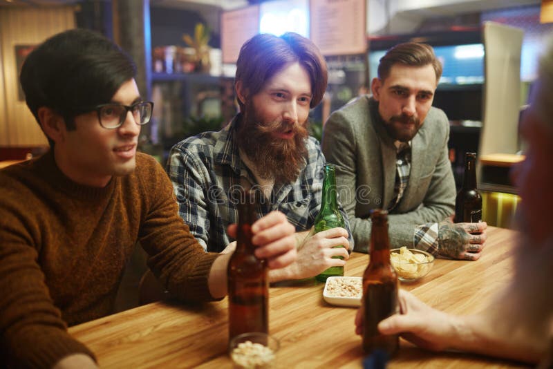 Rest with beer stock image. Image of group, talking, friendly - 87440917