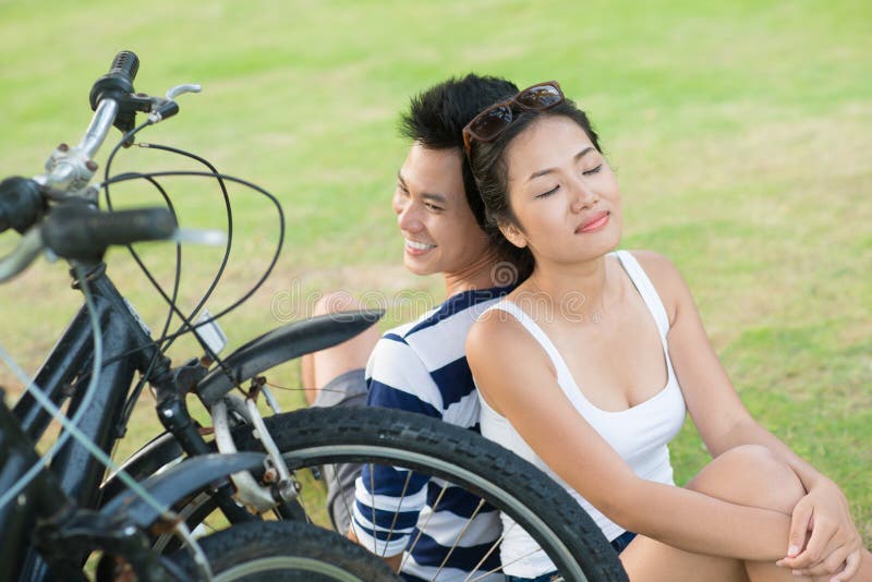 Rest after biking stock image. Image of boyfriend, park - 43962209