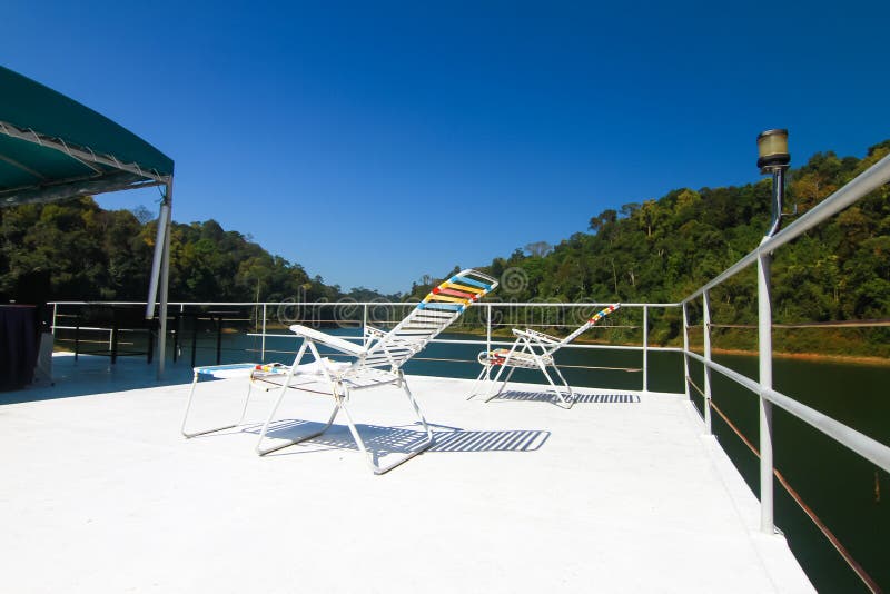 Rest Chairs on Top of Houseboat Stock Photo - Image of lake, nature ...