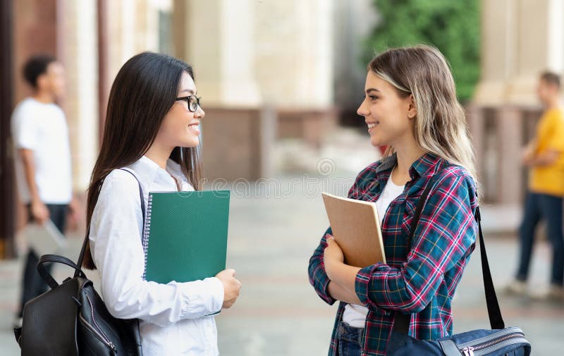 Rest between Lectures. Girls Talking Outdoors after Class Stock Image ...