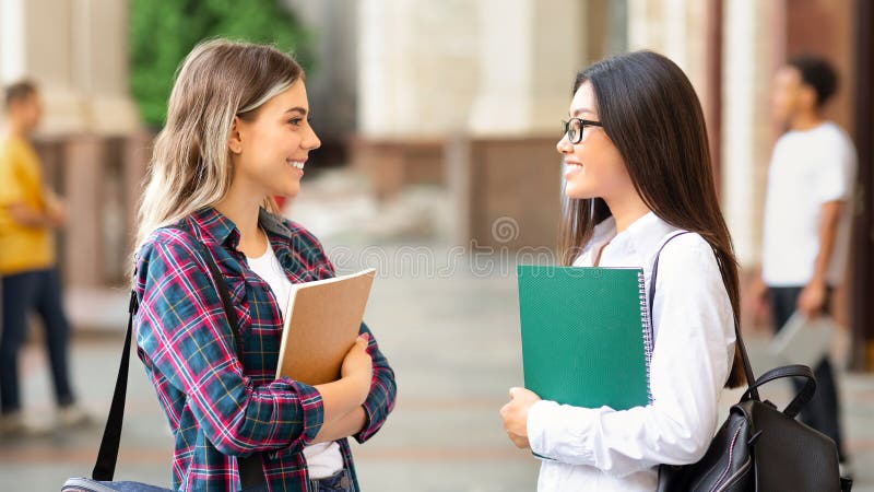 Rest between Lectures. Girls Talking Outdoors after Class Stock Image ...