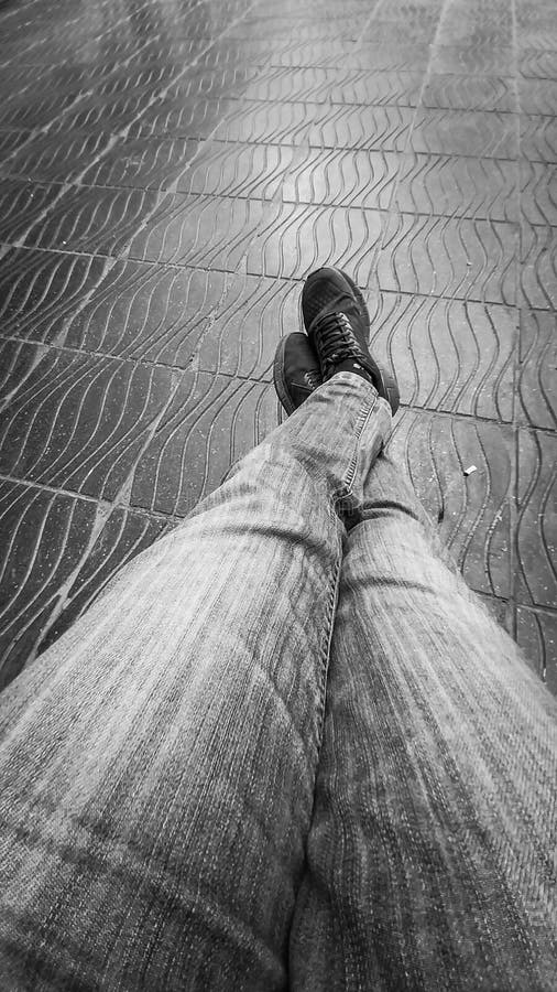 Rest, Person Lying Down Stretching and Crossing Legs on Textured Floor ...