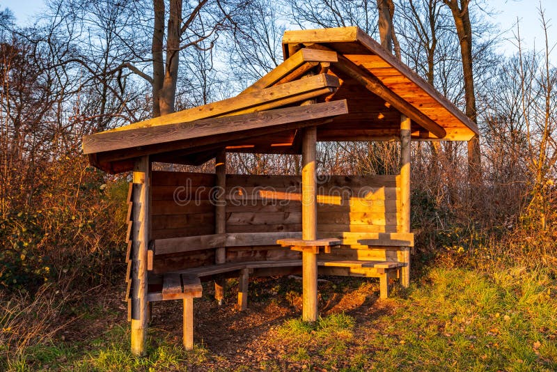 A Shelter For Rest With Benches And A Table Standing In The Shade Of ...