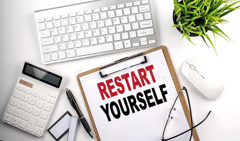 RESTART YOURSELF Text on White Paper. the Inscription on the Notebook ...