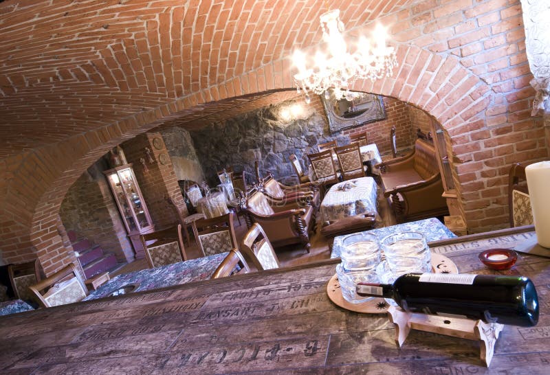 Restaurant in Brick Basement Stock Photo - Image of candle, antiques ...