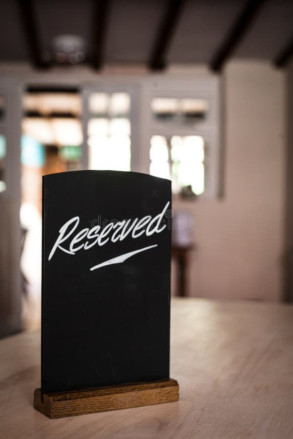 Restaurant Cafe Table with Reserved Sign Tableware on an Empty Table ...