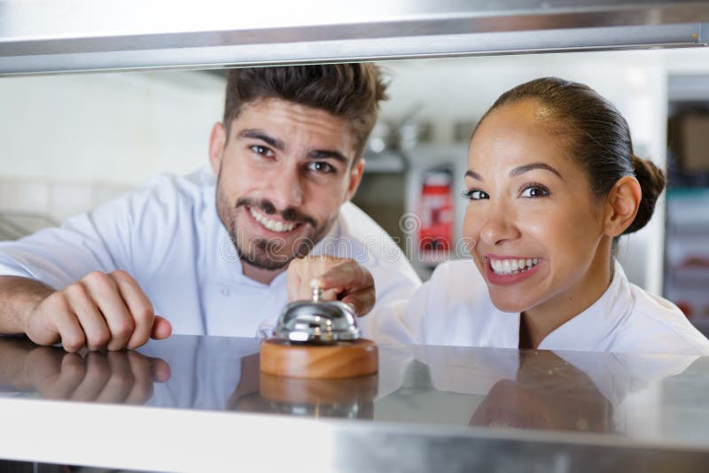 Restaurant Chef Smiling Pointing at Kitchen Bell Stock Image - Image of ...