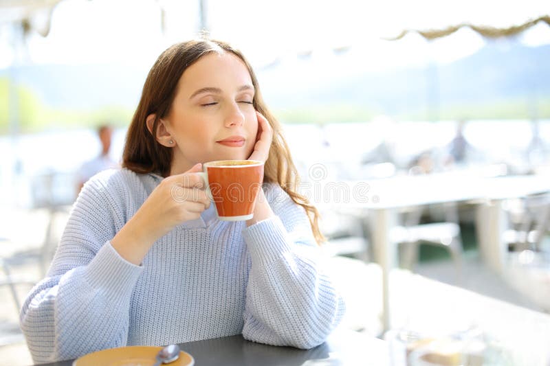 Happy Restaurant Customer Holding Coffee Looking at Camera Stock Photo ...