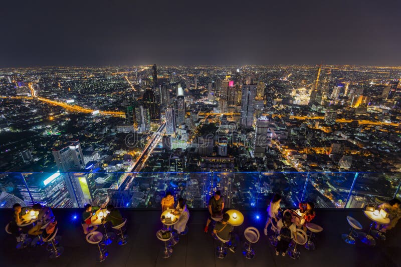 Restaurant Dining Table and View of Business Building on Terrace at ...