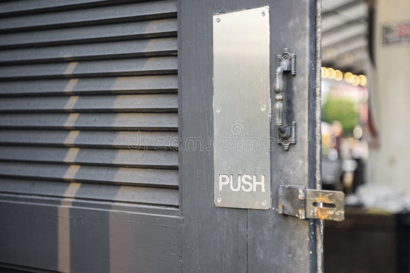 Restaurant Door Handle with Push Sign on Doors Stock Photo - Image of ...